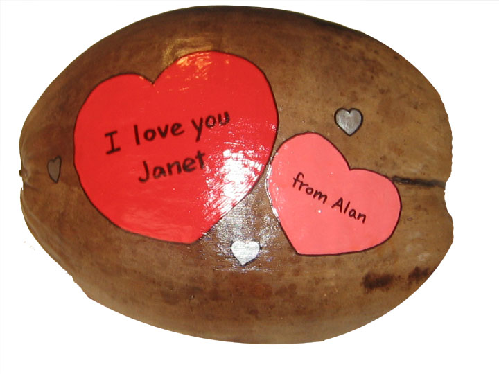 Personalized hand painted coconuts for holiday gifts